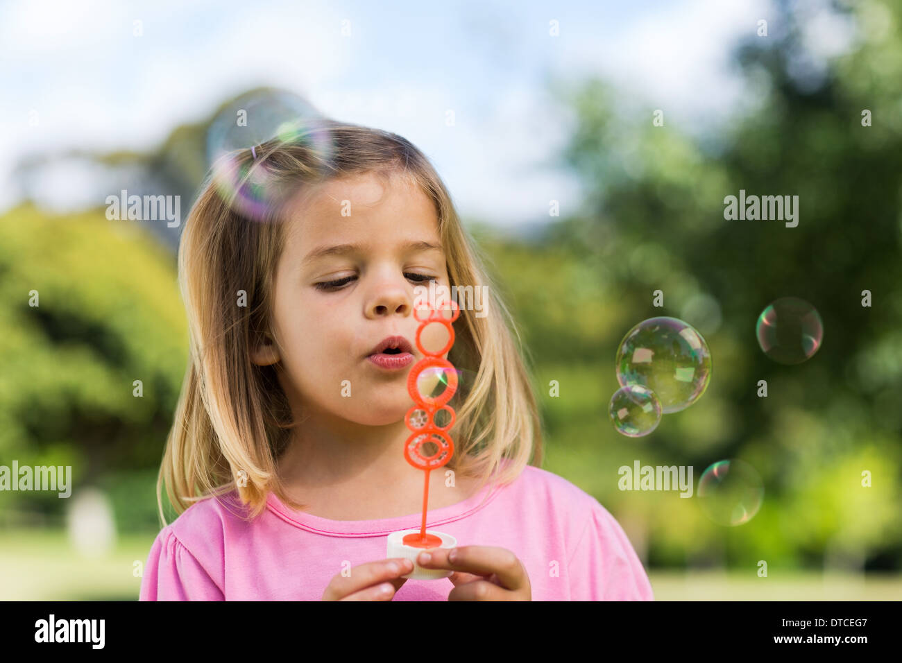 Cute caucasian girl blowing soap hi-res stock photography and images ...