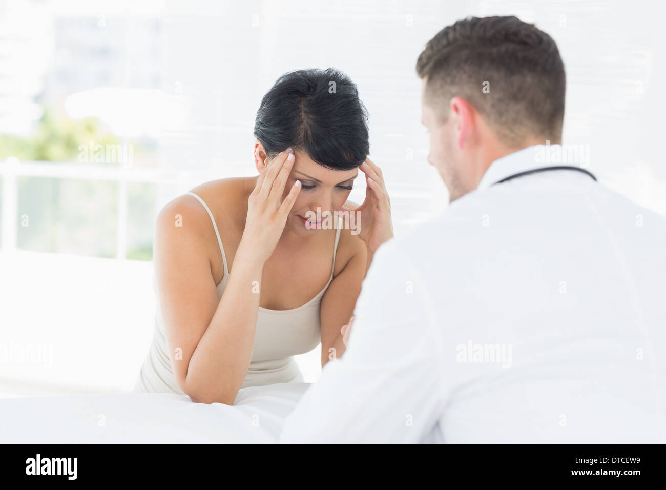 Anxiety woman doctor hi-res stock photography and images - Alamy