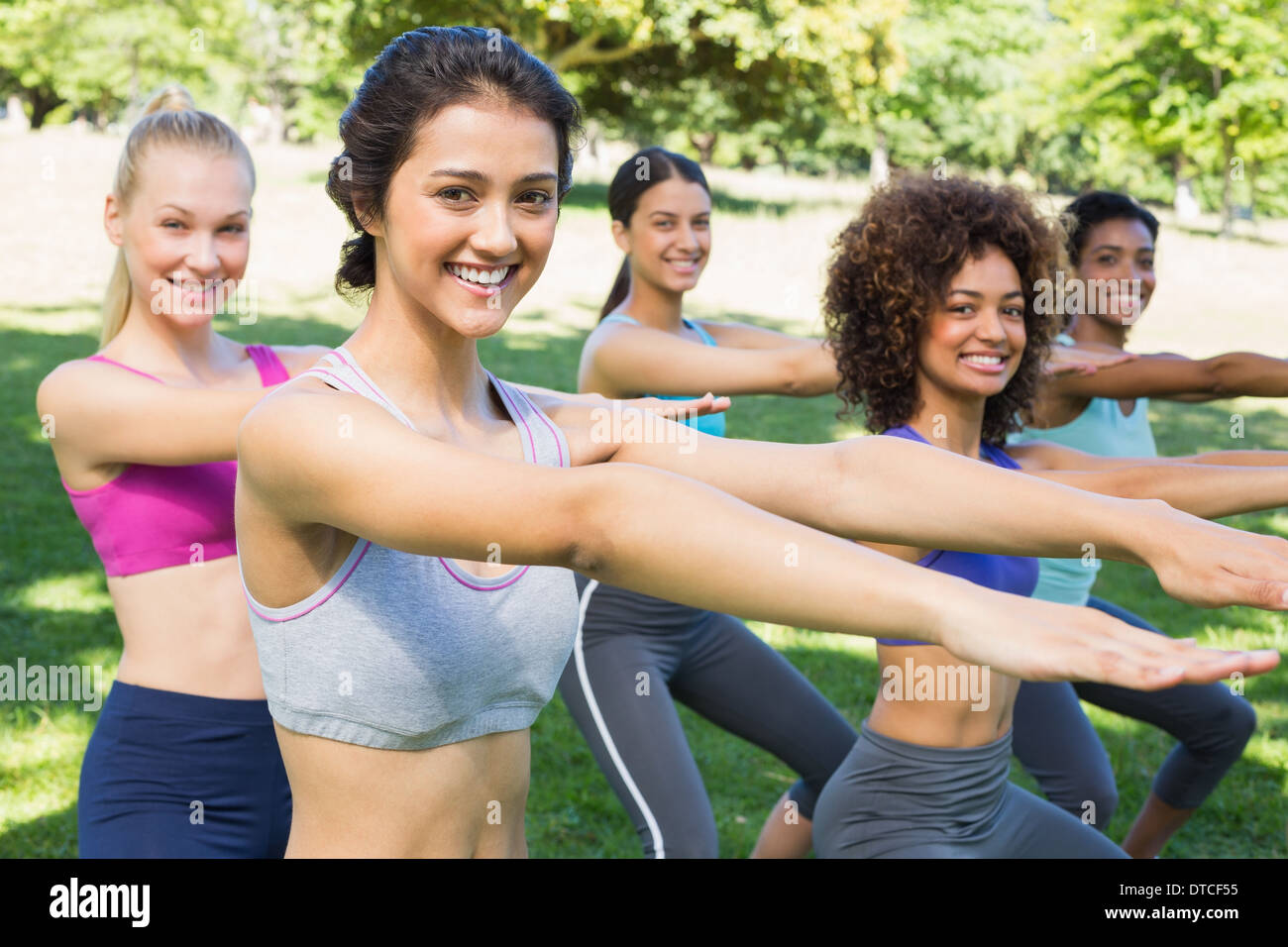 Fit women stretching in park Stock Photo - Alamy