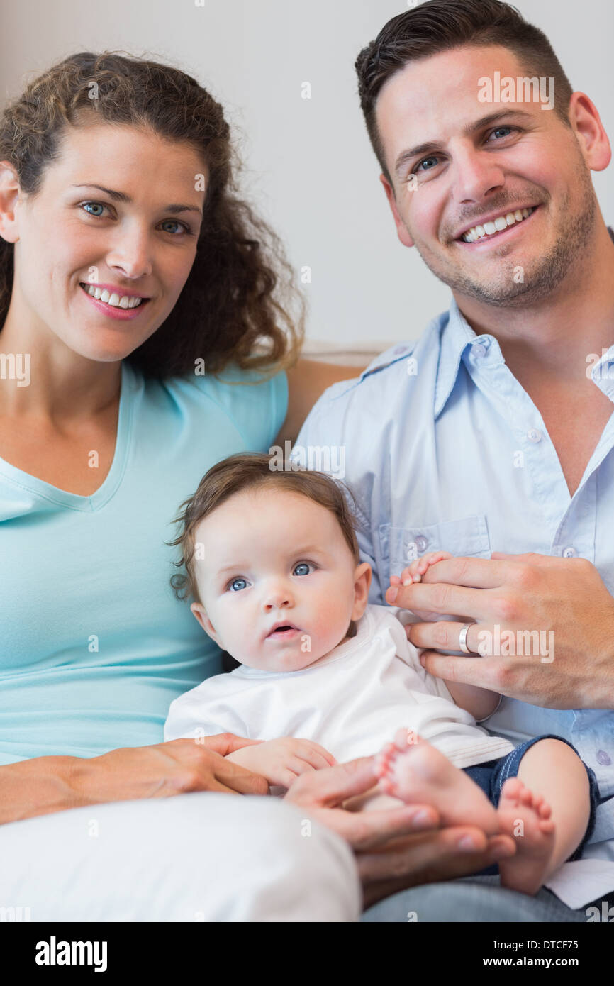 Happy parents with baby boy Stock Photo - Alamy
