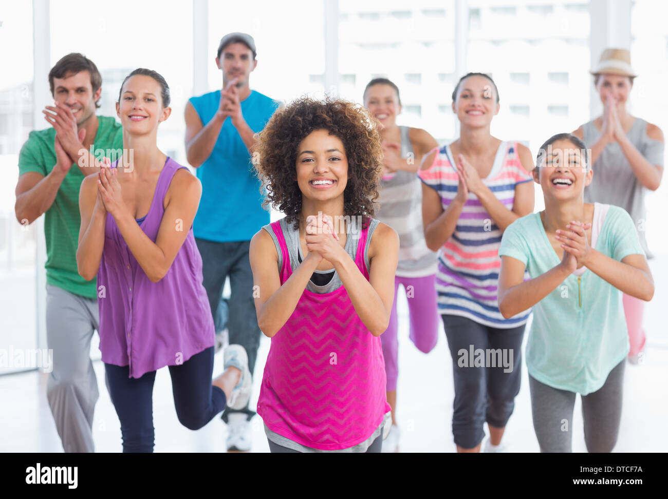Cheerful instructor doing yoga hi-res stock photography and images - Alamy