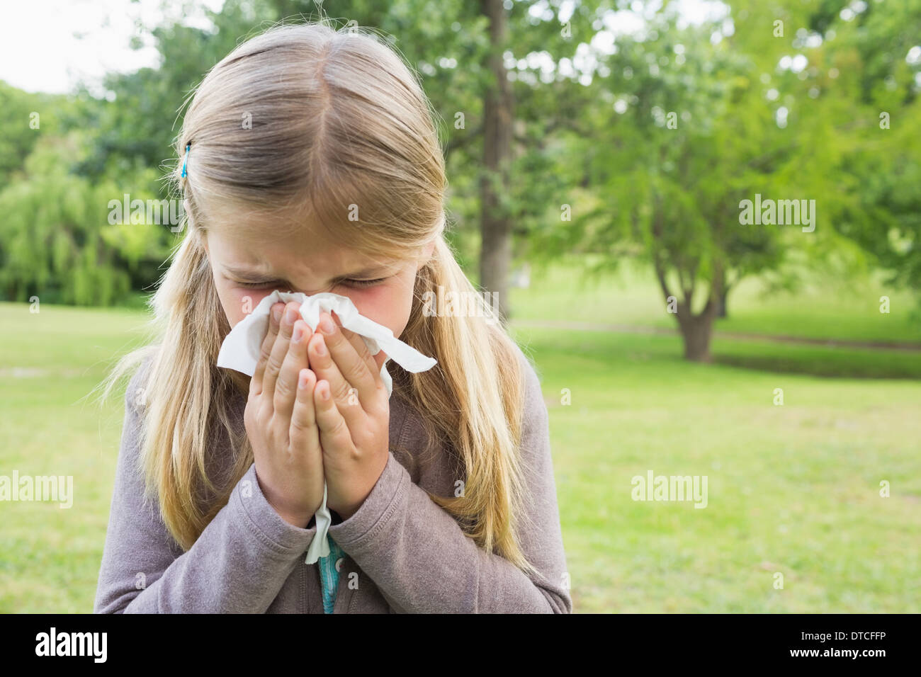 Girl blowing nose tissue paper hi-res stock photography and images - Alamy