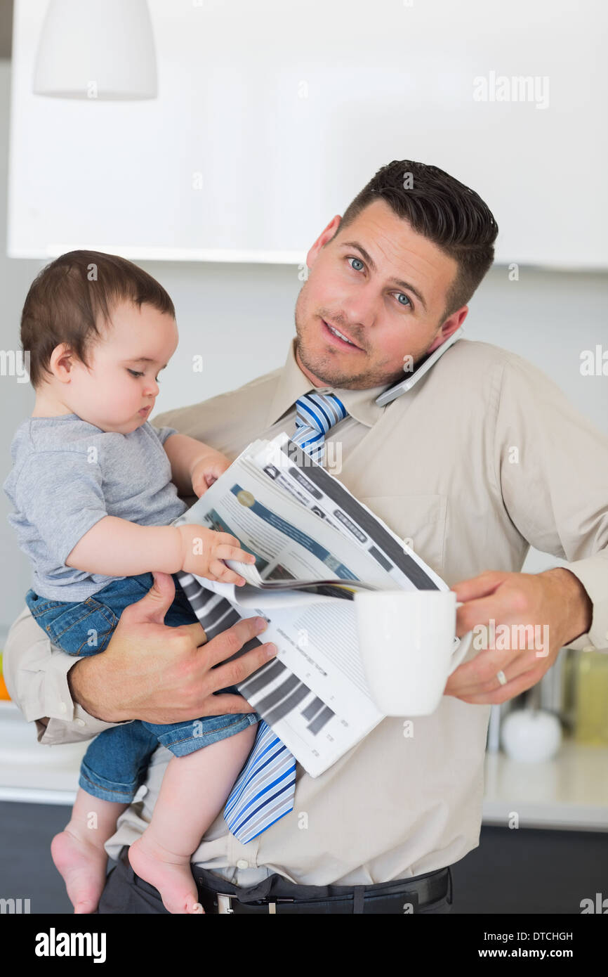 Portrait of family looking at documents hi-res stock photography and ...