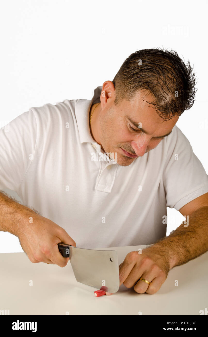 Size matters, a concept with a guy trying to chop a tiny thing with a ...