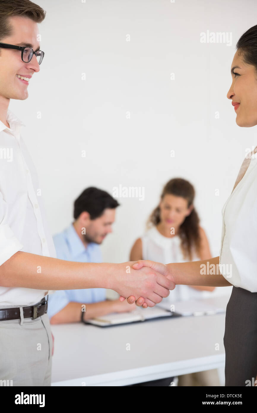 Business people greeting each other Stock Photo - Alamy