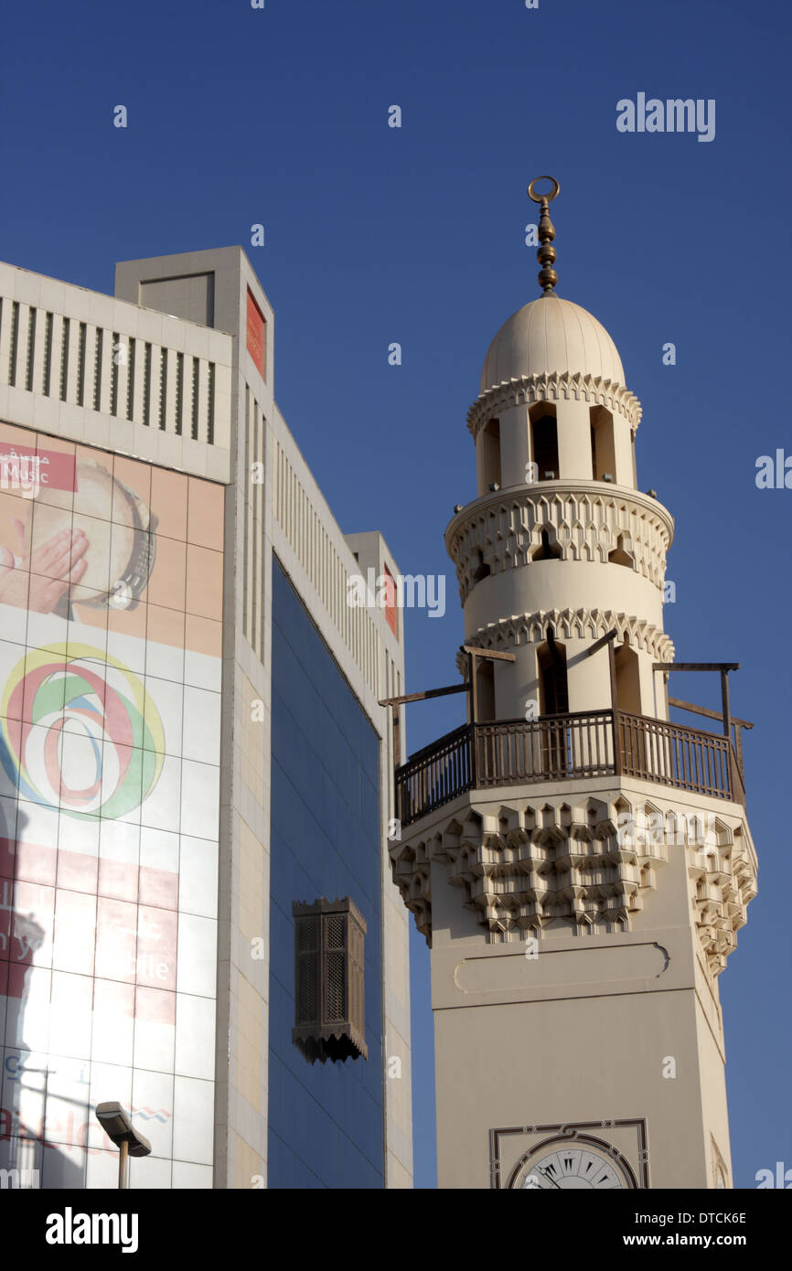 Minaret of the Al Yateem Mosque, next to the Batelco Building, Manama ...