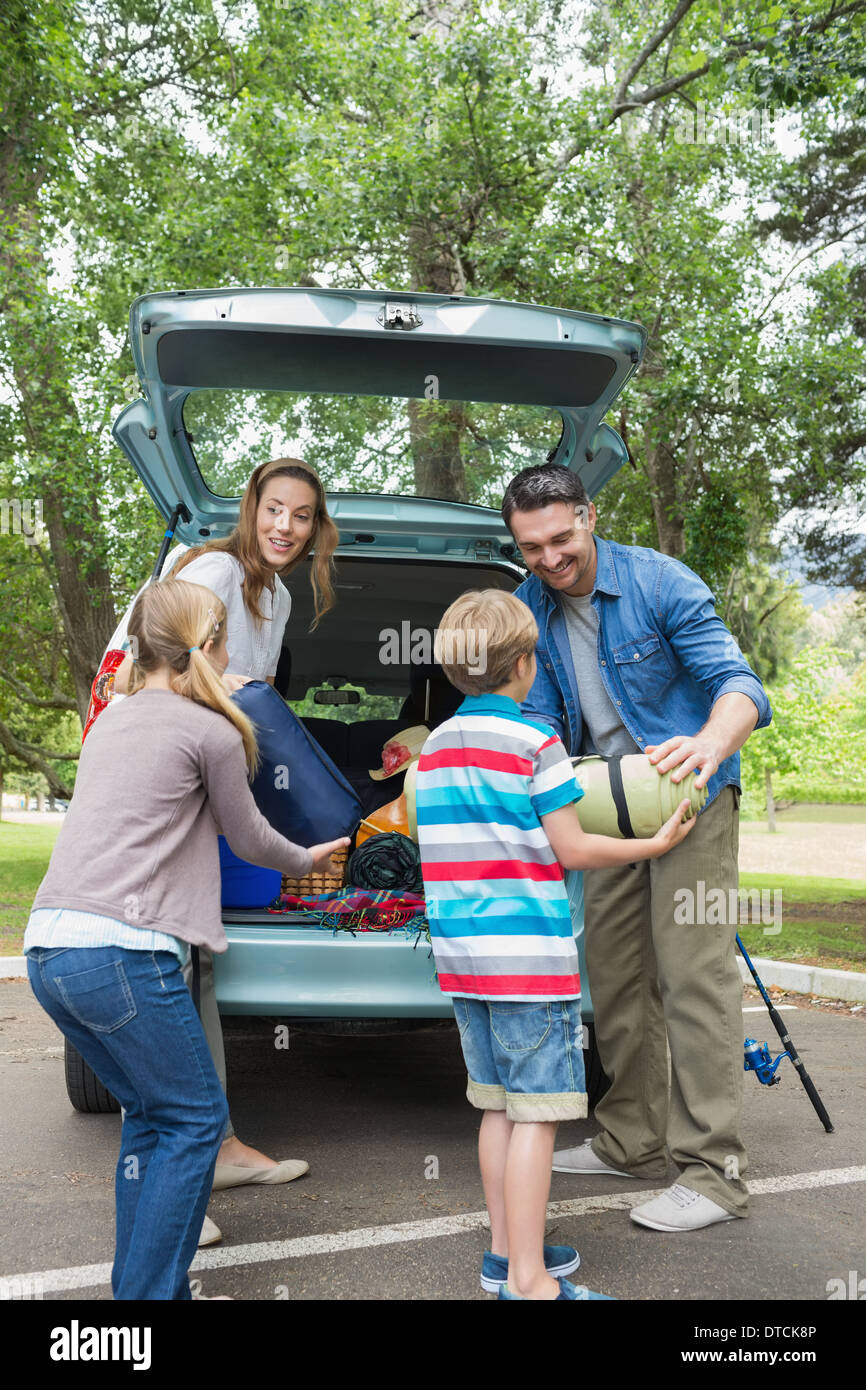 Family unloading car trunk while on picnic Stock Photo - Alamy