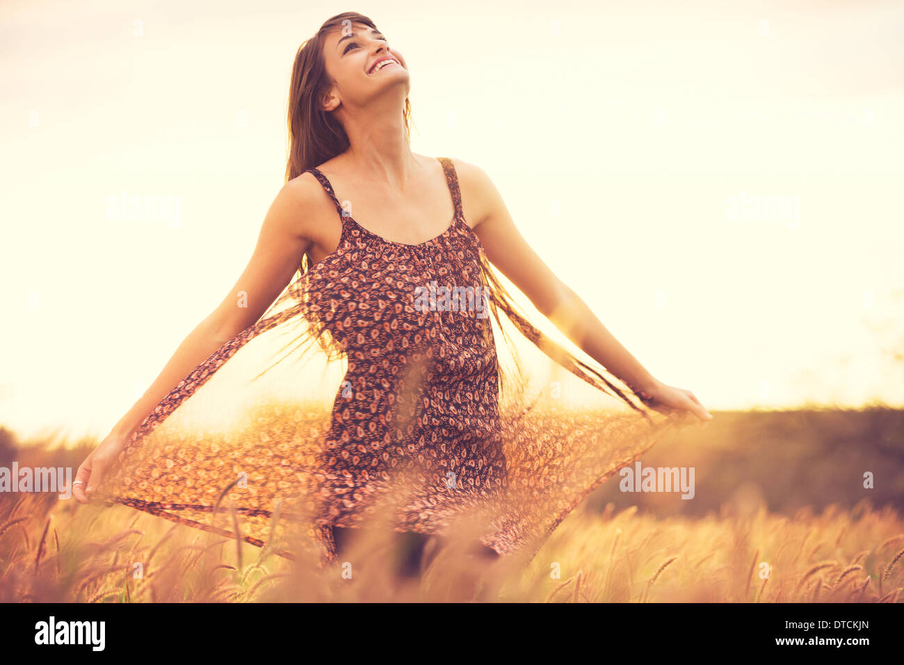 Enjoying Glowing Sunlight. Backlit. Warm color tones with slight Motion ...
