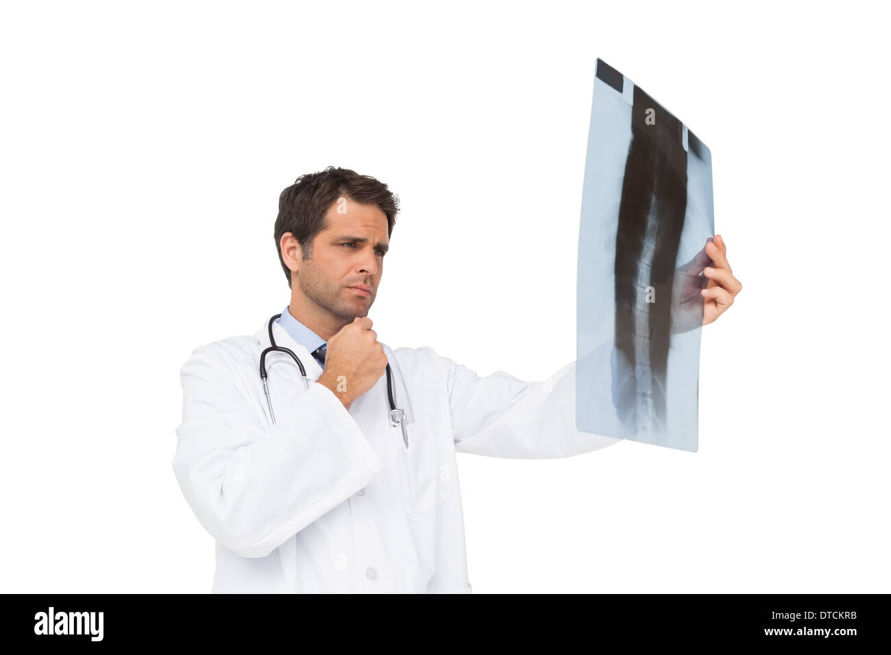 Focused doctor analysing xray Stock Photo - Alamy