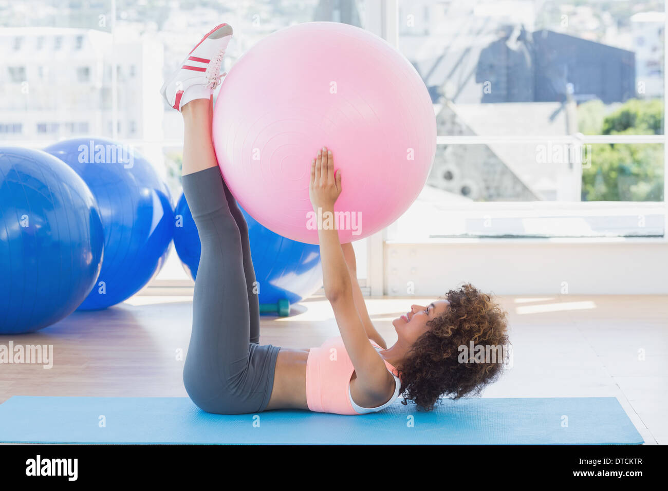 Woman exercise ball in hi-res stock photography and images - Alamy