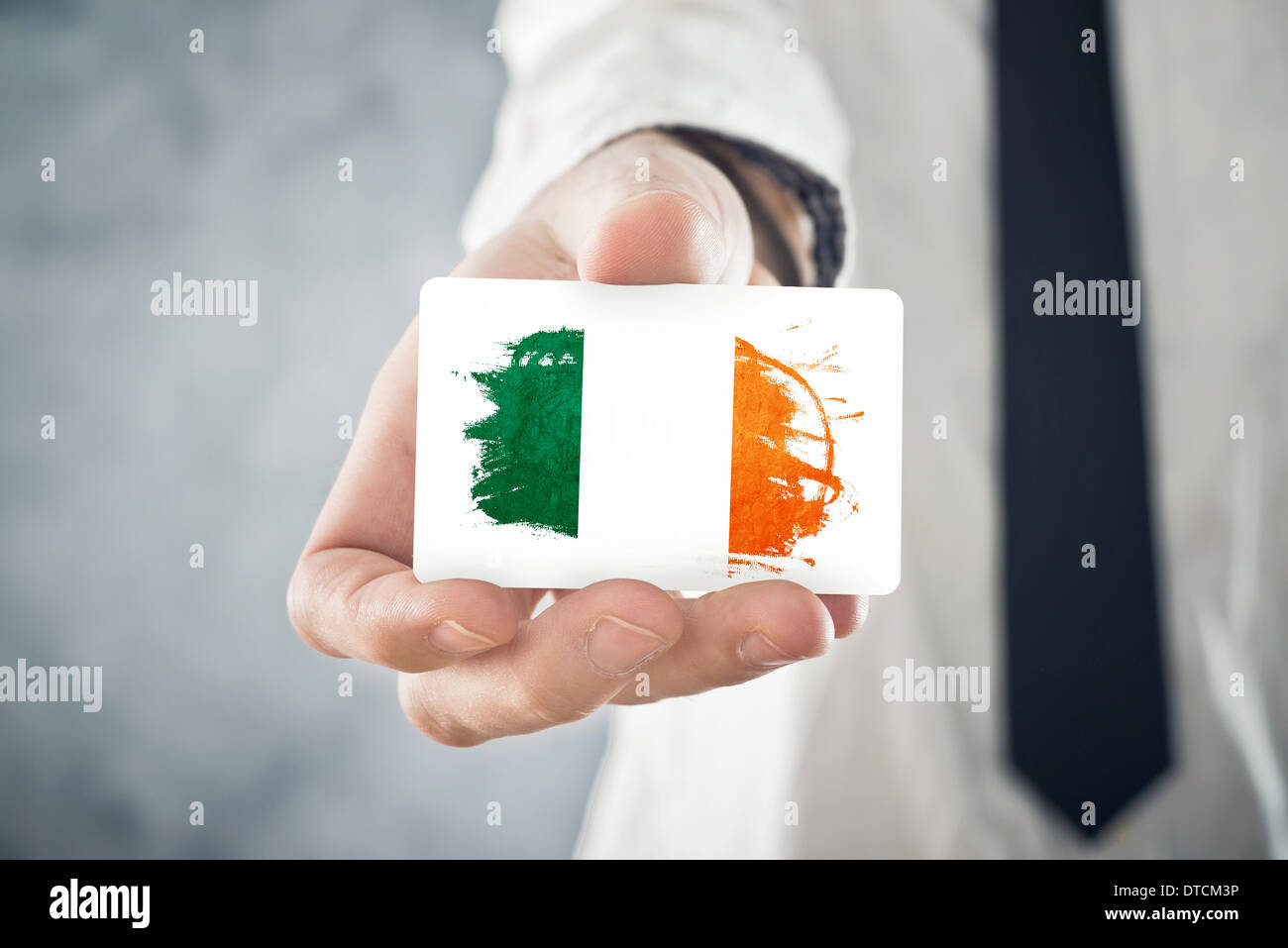 Irish Businessman holding business card with Ireland Flag ...