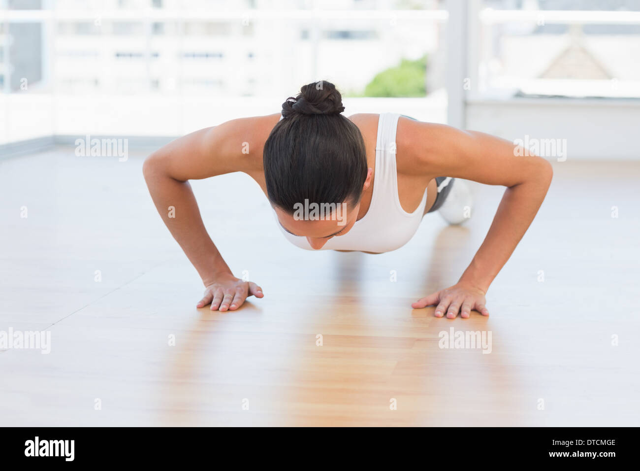 Beautiful woman doing push ups hi-res stock photography and images - Alamy
