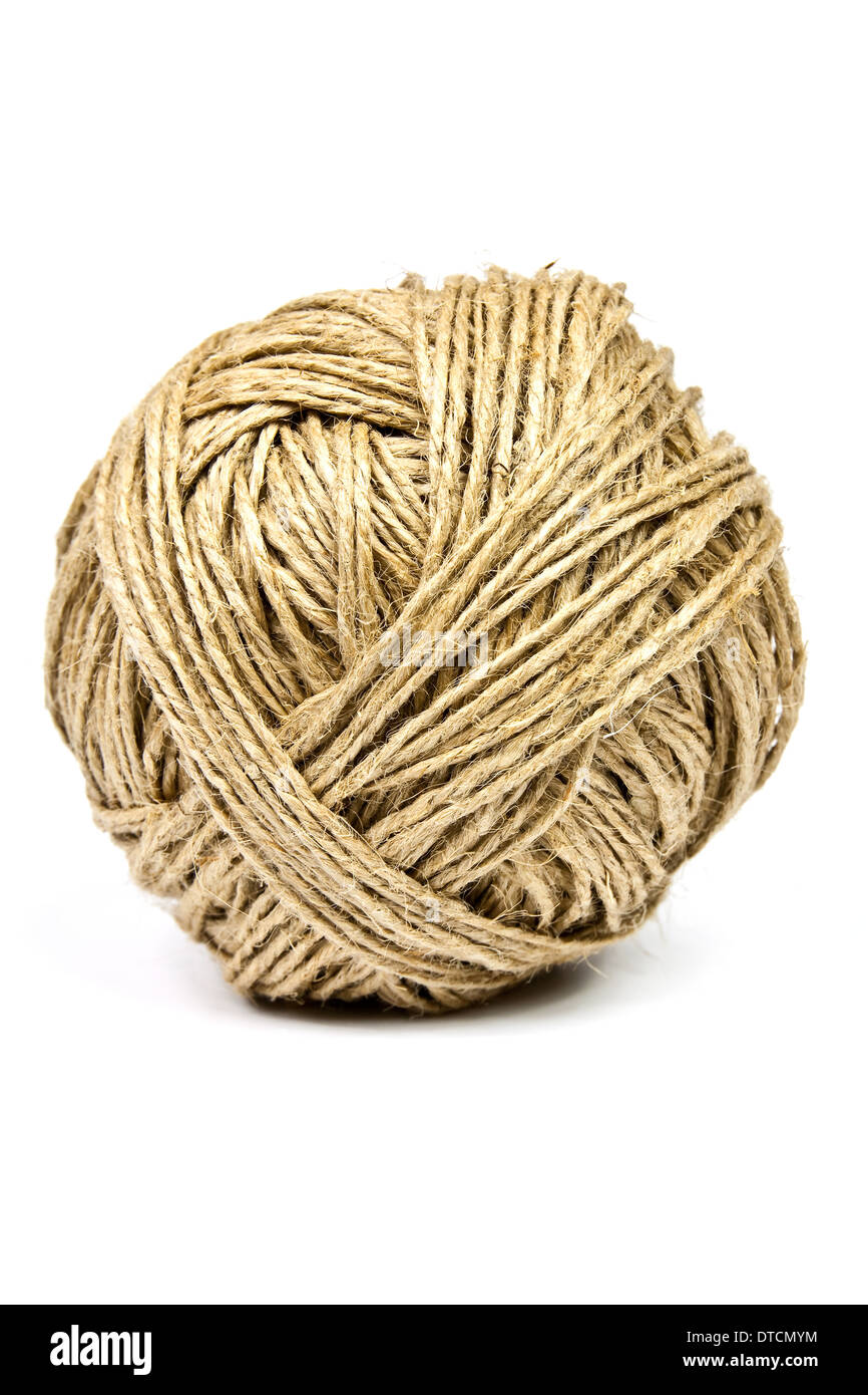 Winding the hand ball of string on white background Stock Photo - Alamy