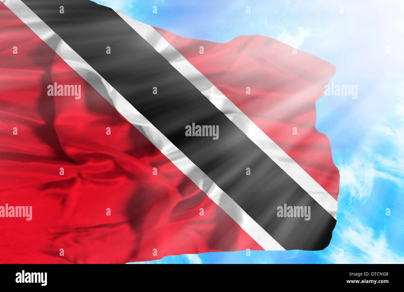 Trinidad and Tobago waving flag against blue sky with sunrays Stock ...