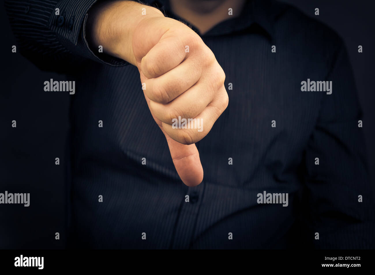 Closeup of man hand showing thumbs down Stock Photo - Alamy