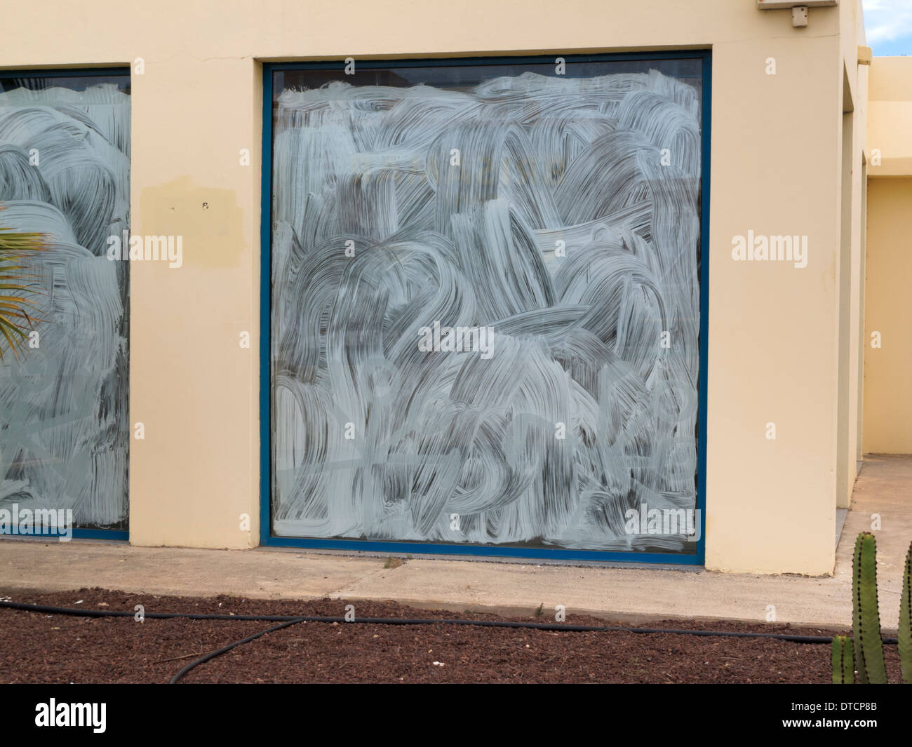 empty blanked out shop window Stock Photo - Alamy