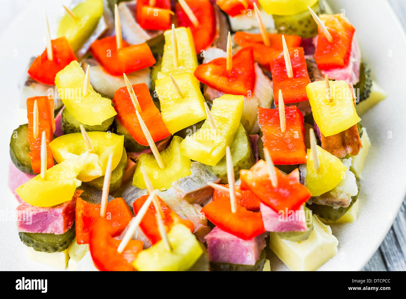 Mini sandwiches on toothpicks as an appetizer Stock Photo - Alamy