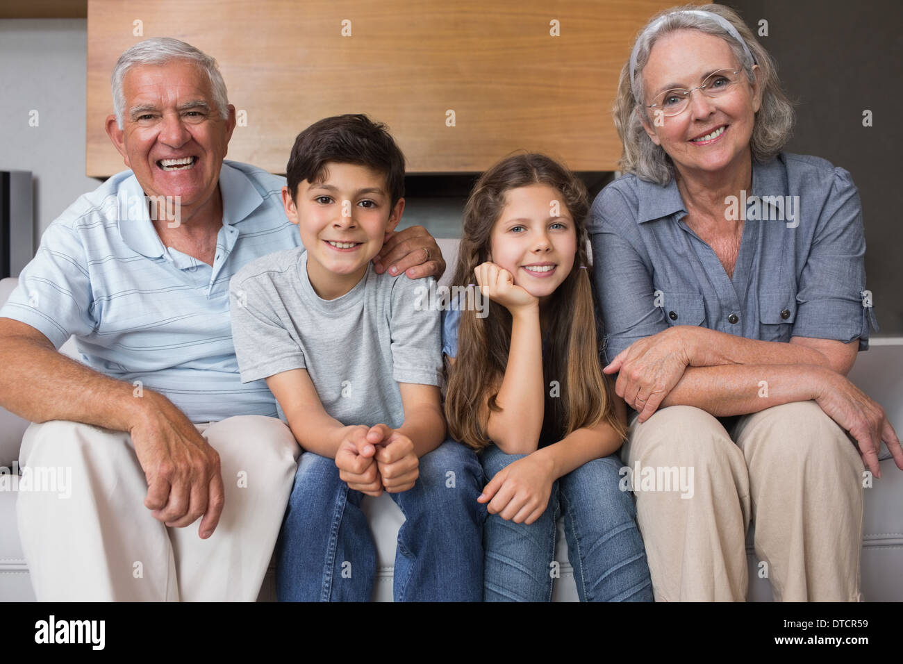 Grandparents grandson in home sitting hi-res stock photography and ...