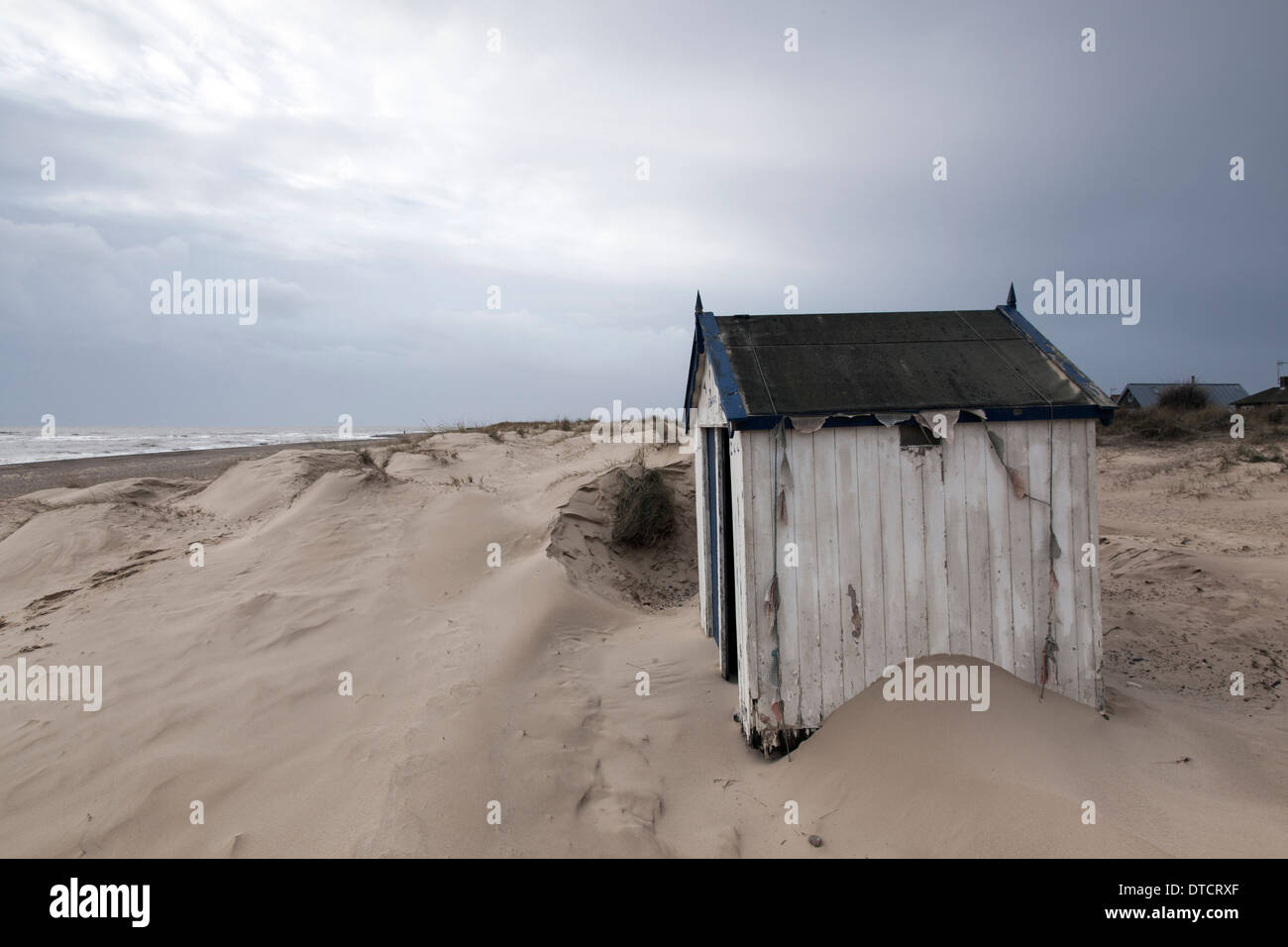Neglected Beach Huts in Sand Dunes Stock Photo - Alamy