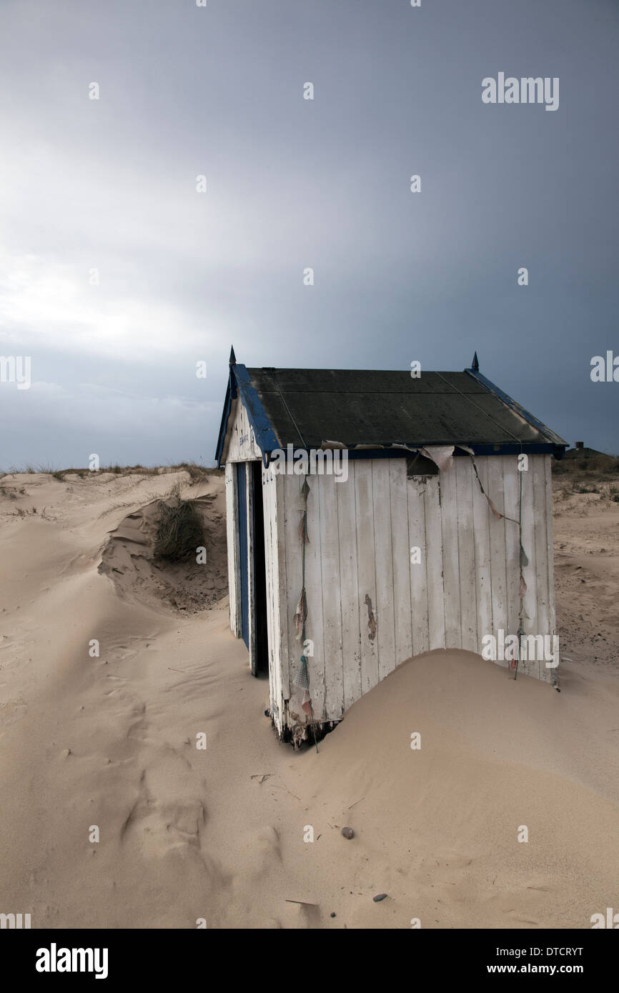 Neglected Beach Huts in Sand Dunes Stock Photo - Alamy