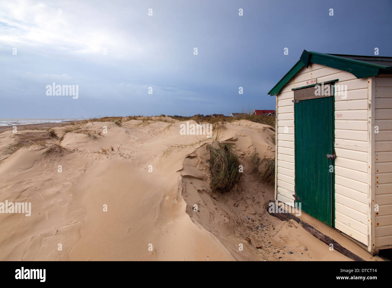 Neglected Beach Huts in Sand Dunes Stock Photo - Alamy