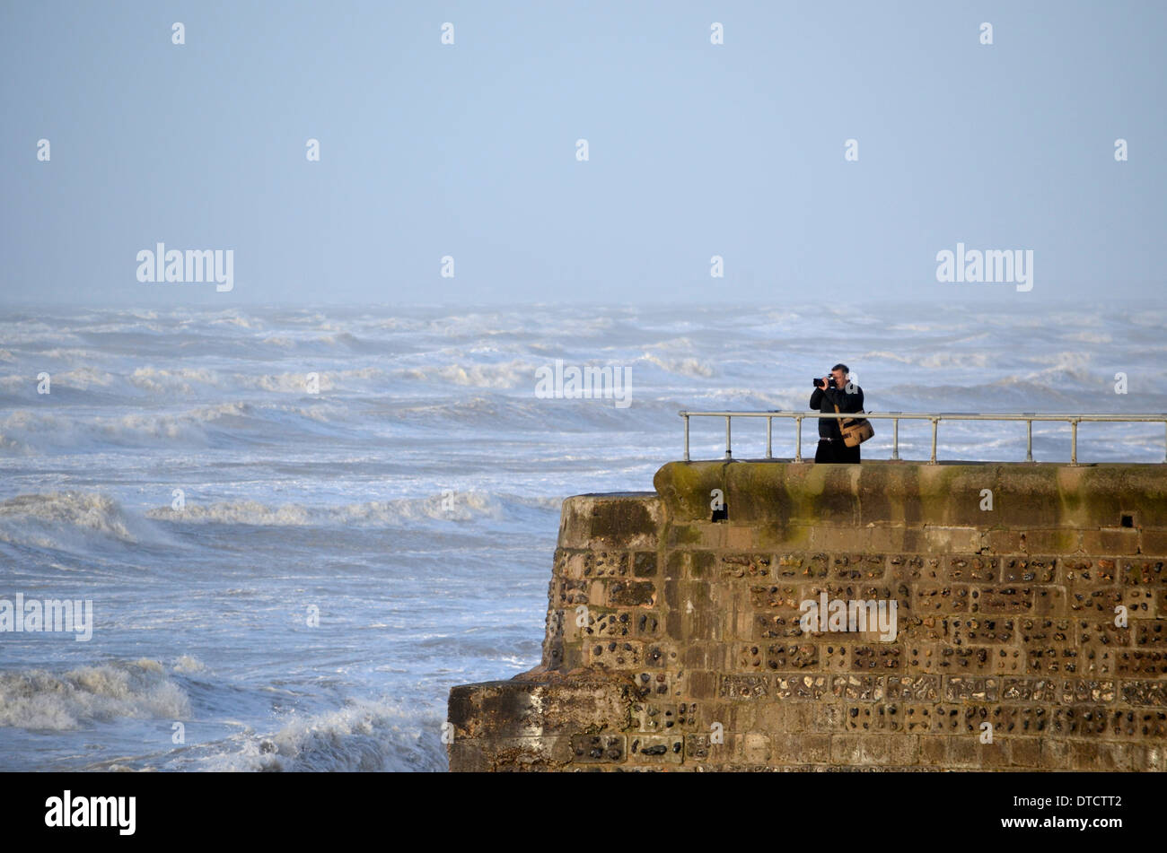 Brighton Hove seafront prom promenade winter storm pebbles railings ...