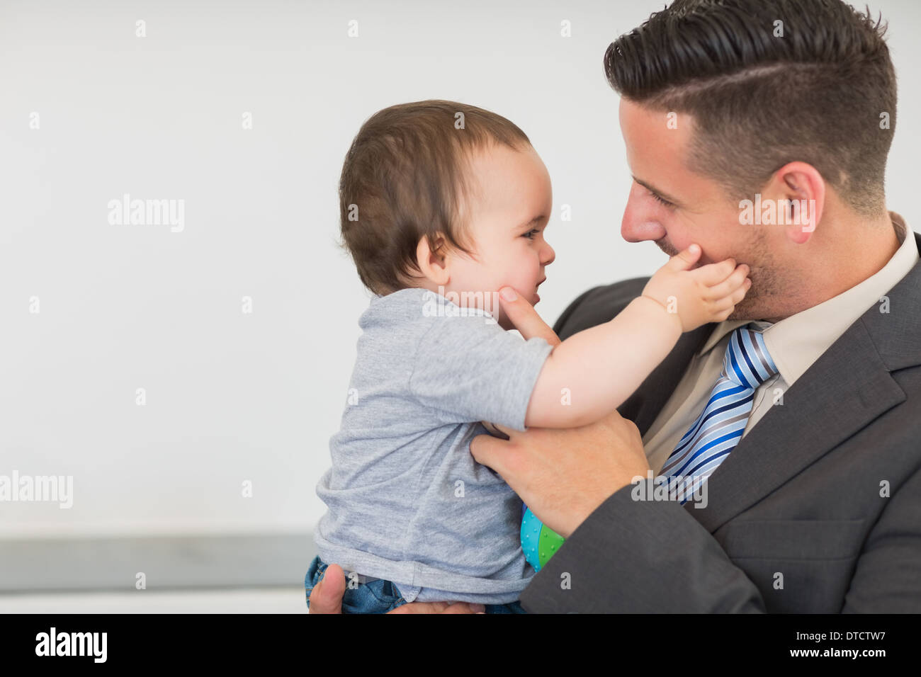 Touching her baby hi-res stock photography and images - Alamy