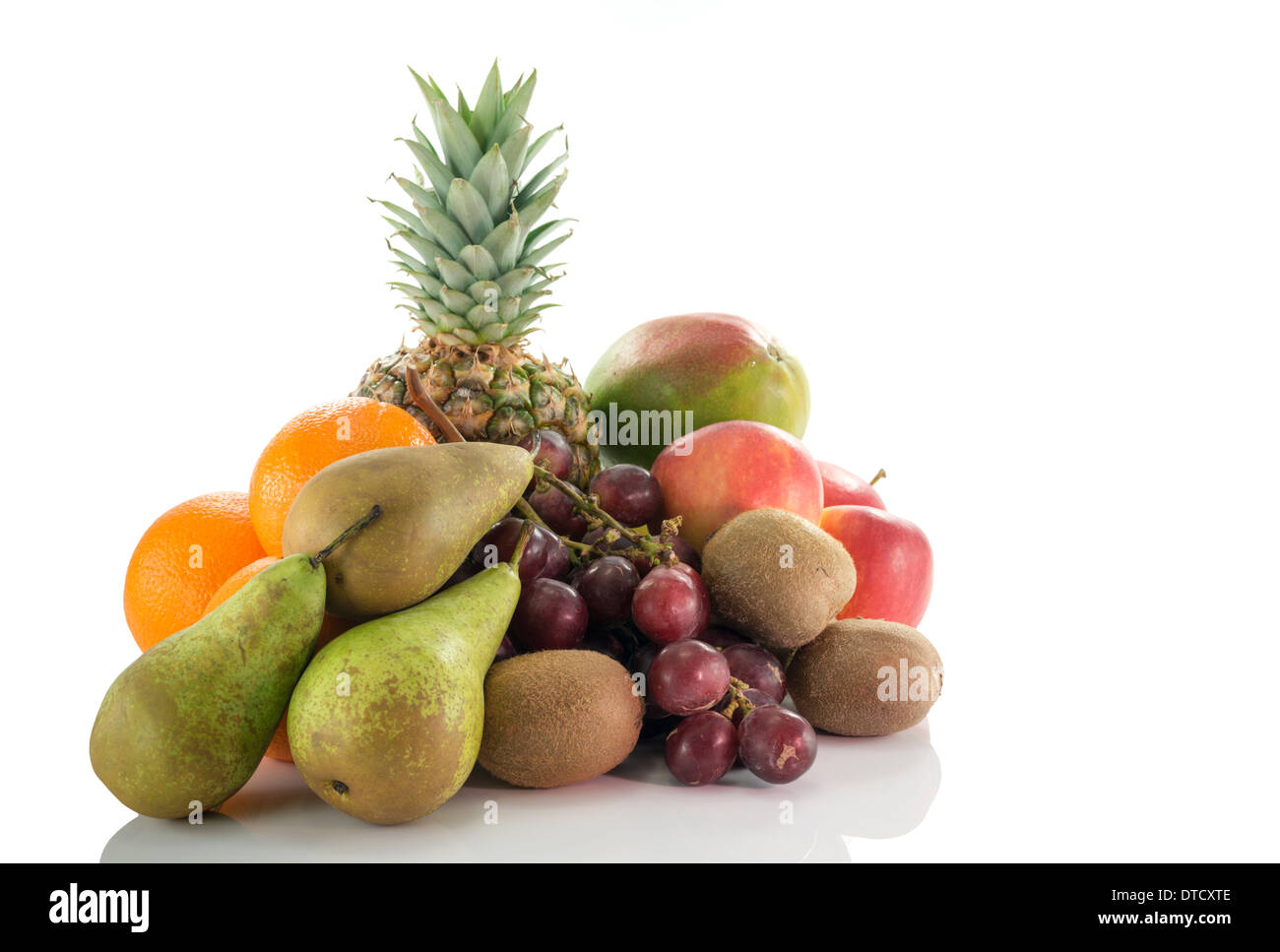 fruit as oranges pineapple grapes apple pear mango and kiwi isolated on ...