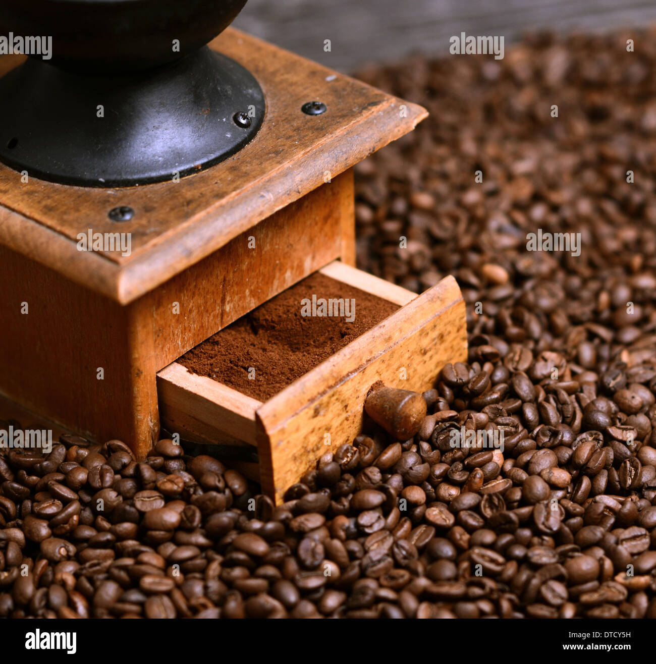 Close up of coffee grinder and grinded coffee Stock Photo - Alamy