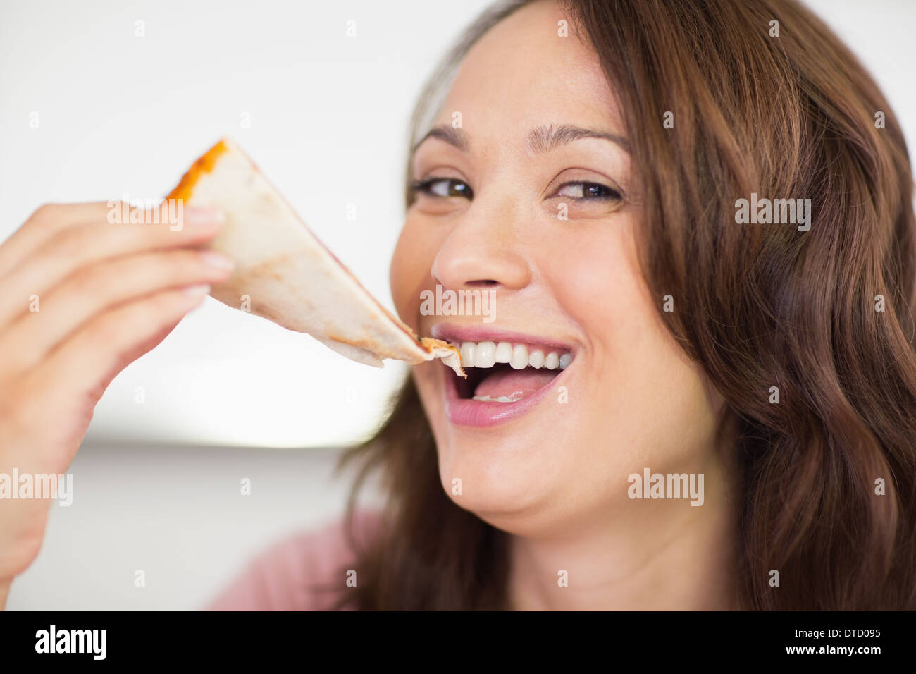 Closeup of a beautiful woman eating sandwich Stock Photo - Alamy