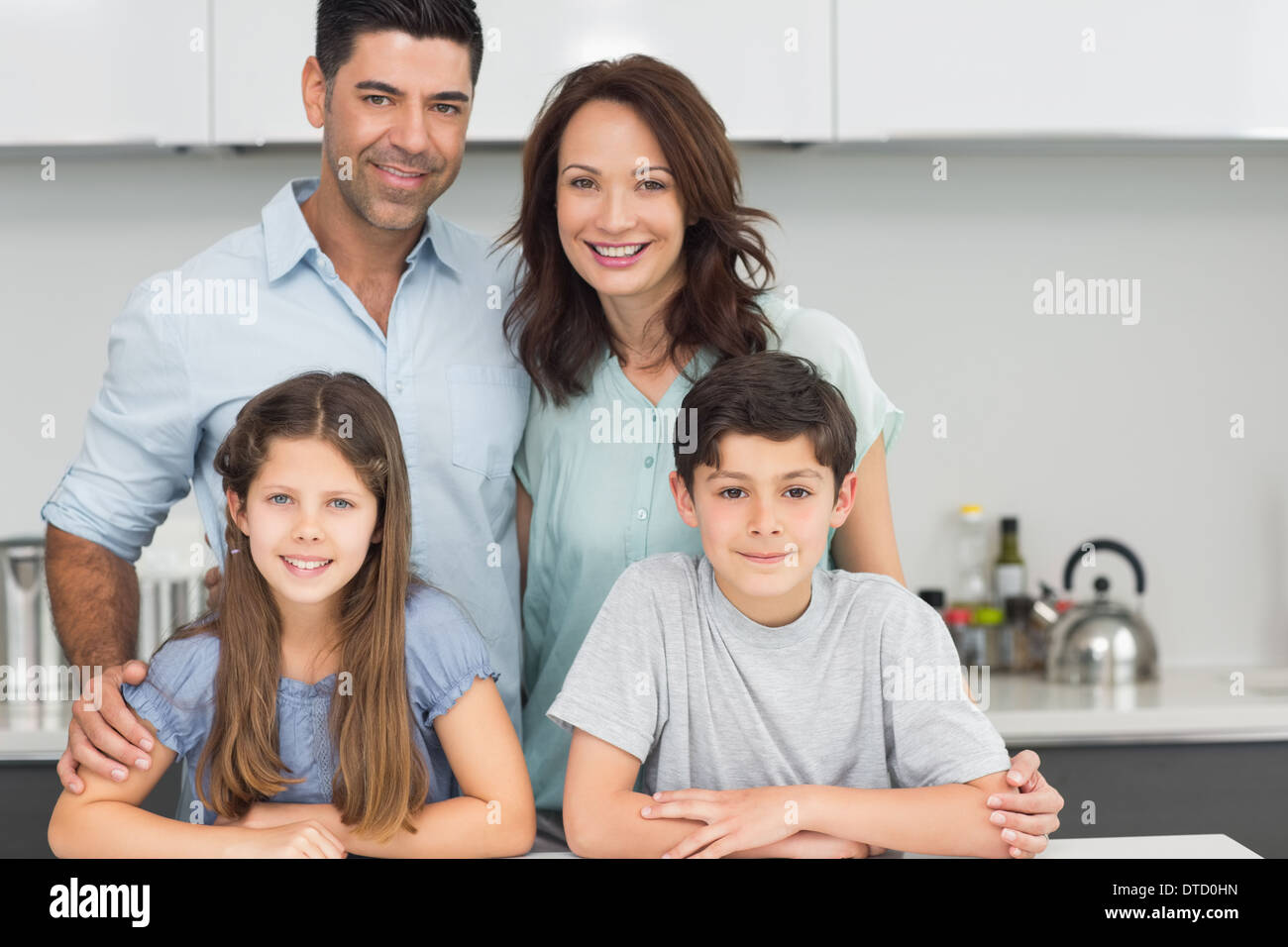 Portrait affectionate family four hi-res stock photography and images ...