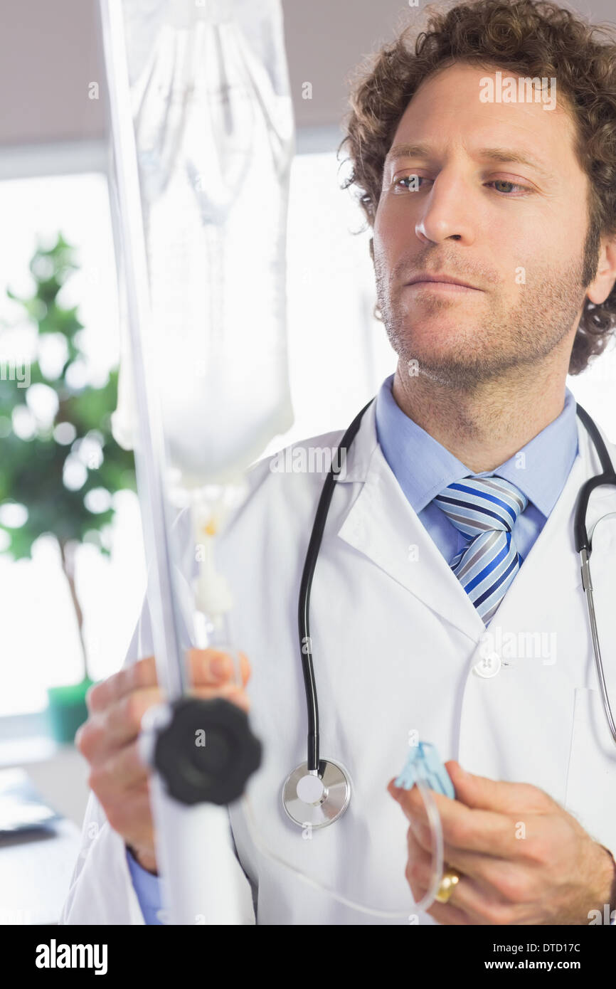 Doctor adjusting hi-res stock photography and images - Alamy