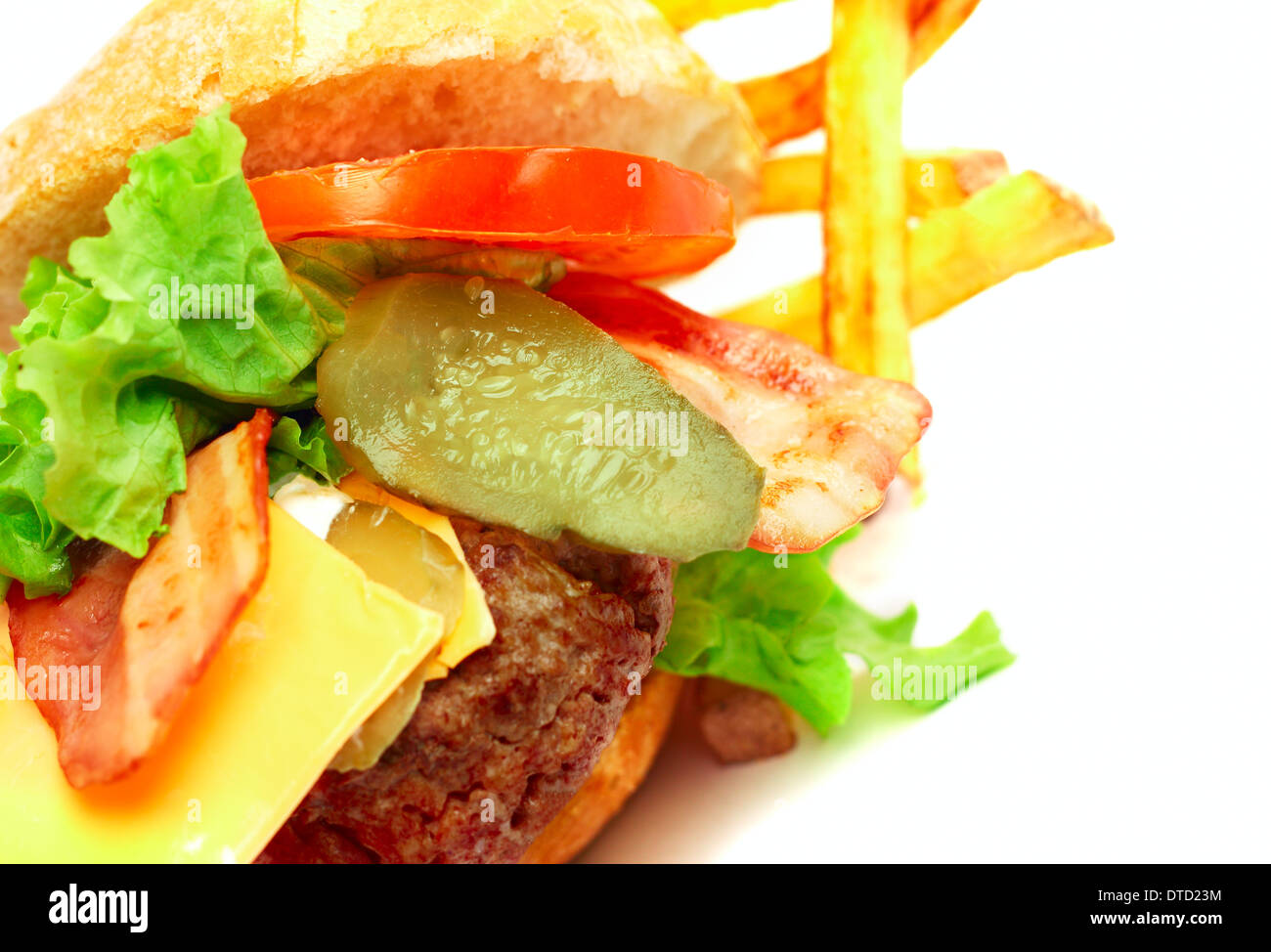 Exploded view of hamburger with french fries isolated on white ...