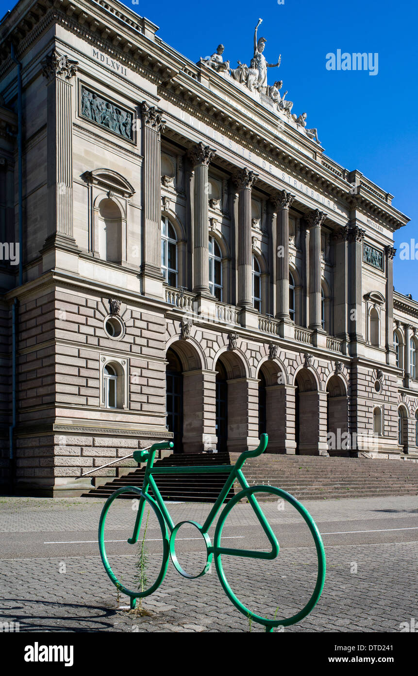 Bicycle parking lot sign and Palais Universitaire University building ...