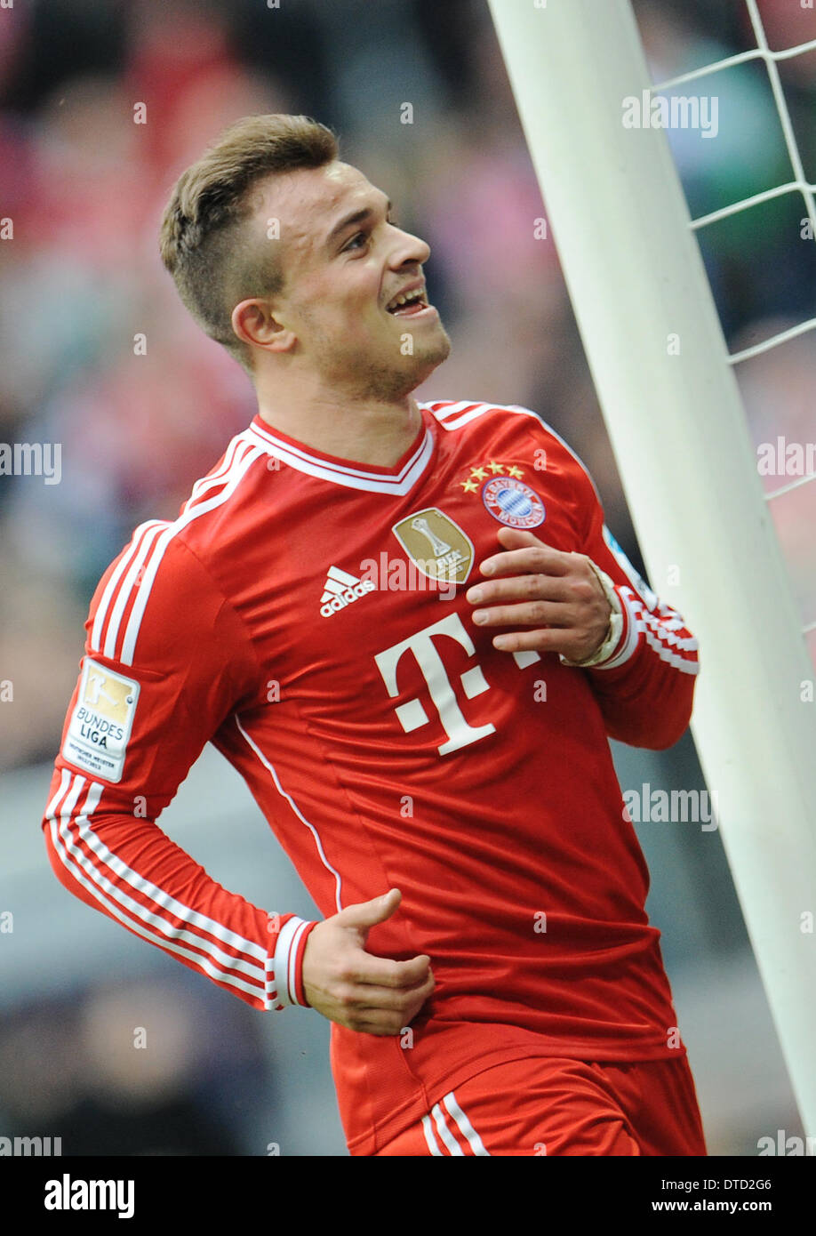 Munich, Germany. 15th Feb, 2014. Munich's Xherdan Shaqiri celebrates ...