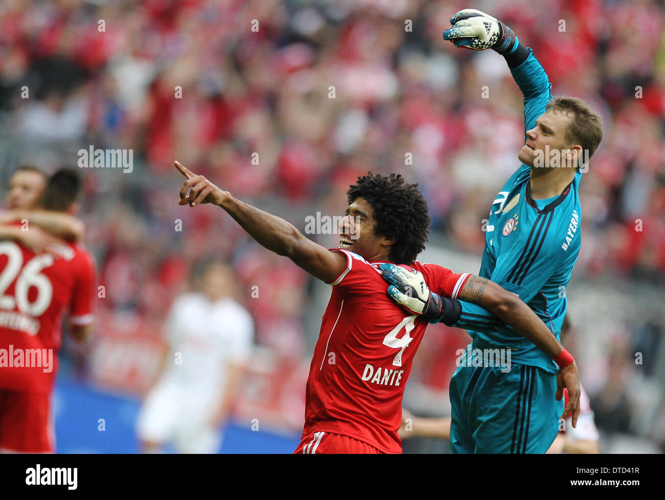 Munich, Germany. 15th Feb, 2014. Munich's Dante (C) celebrates his 1-0 ...