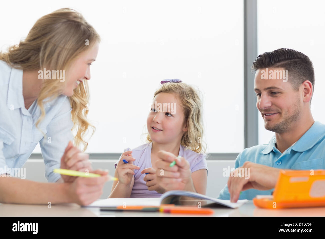 Child assisting parents hi-res stock photography and images - Alamy