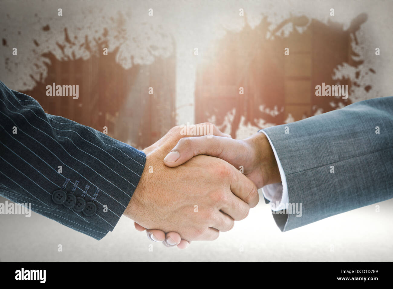 Composite image of business handshake against background Stock Photo ...