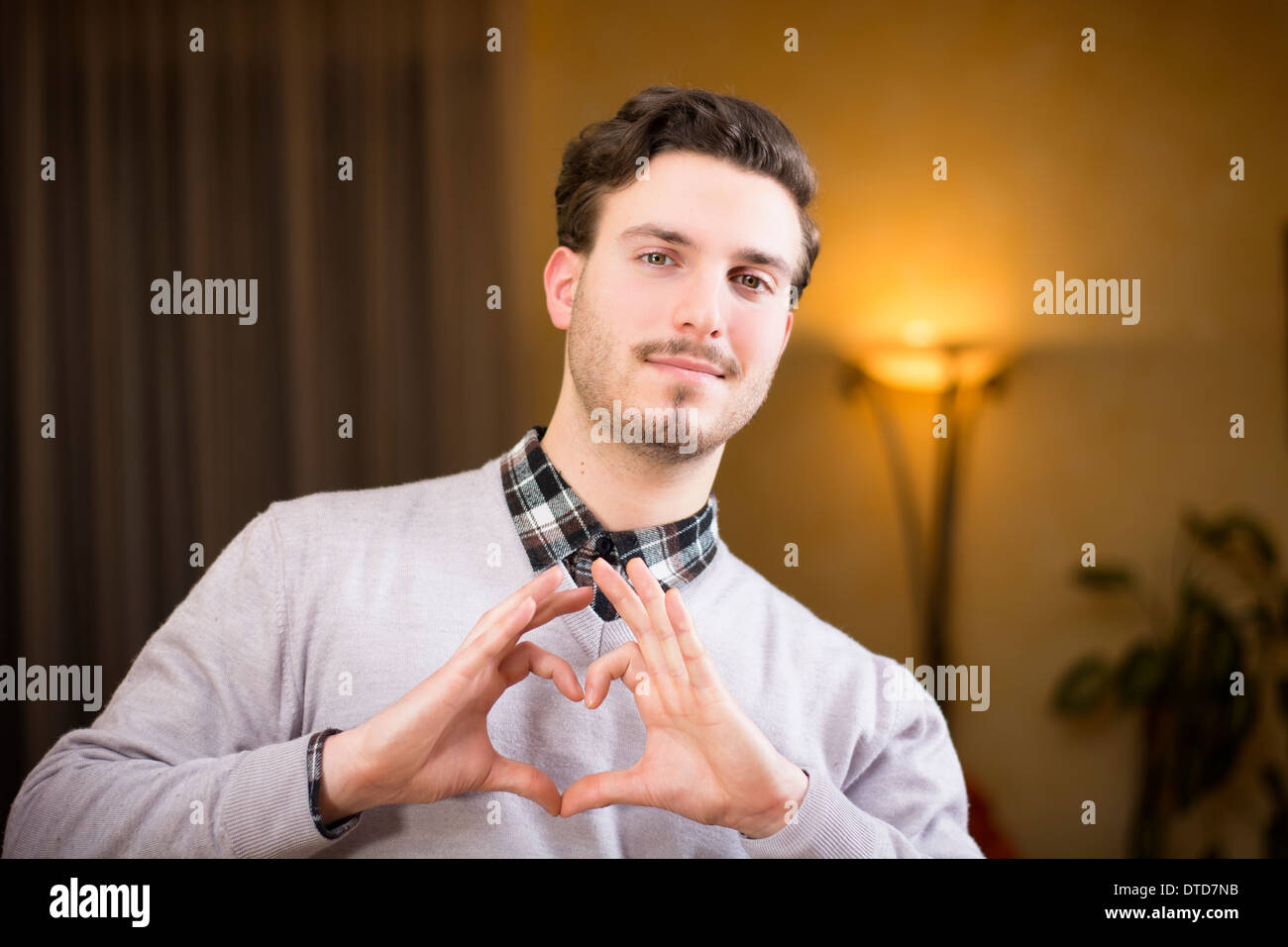 Hands house shape hi-res stock photography and images - Alamy