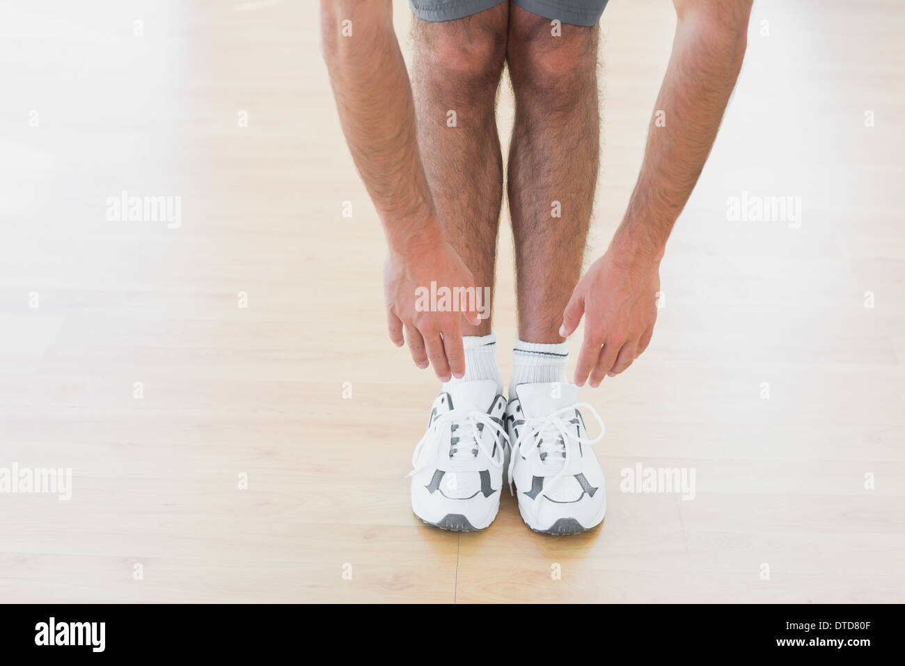 Man touching legs hi-res stock photography and images - Alamy