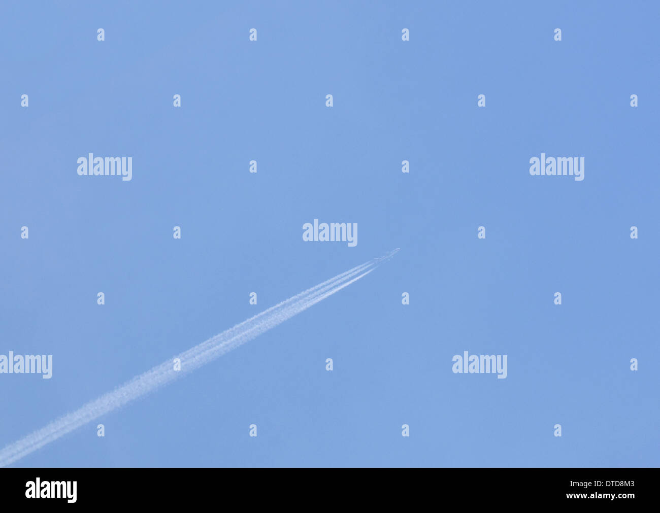 track of plane in a blue sky Stock Photo - Alamy