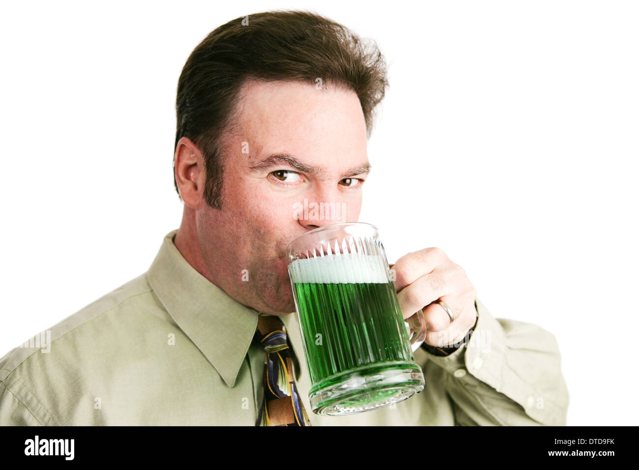 Handsome Irish-american man drinking green beer for St. Patrick's day ...