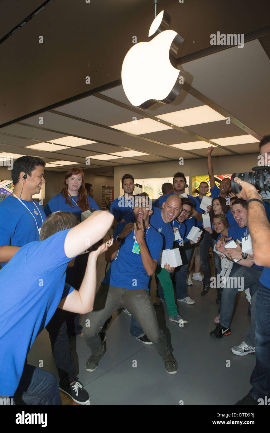 Rio De Janeiro, Brazil. 15th Feb, 2014. Apple clerks pose for photos at ...
