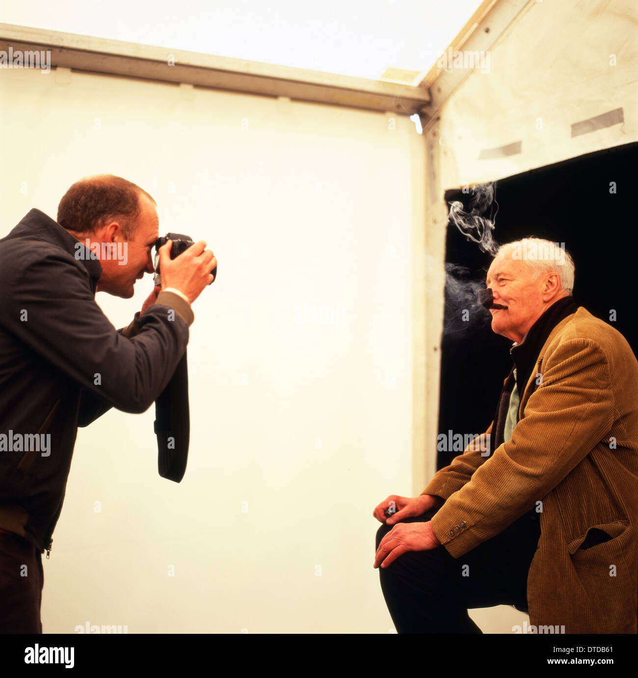 Photographer Martin Godwin photographing Tony Benn at the Hay Festival ...