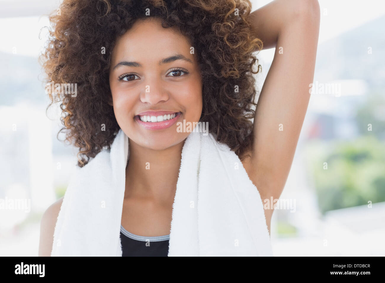 Woman stretching hand behind back hi-res stock photography and images ...