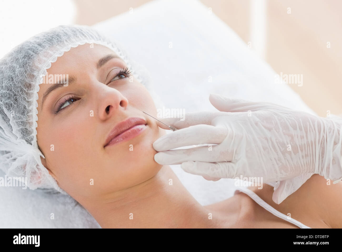Woman recieving botox injection Stock Photo - Alamy