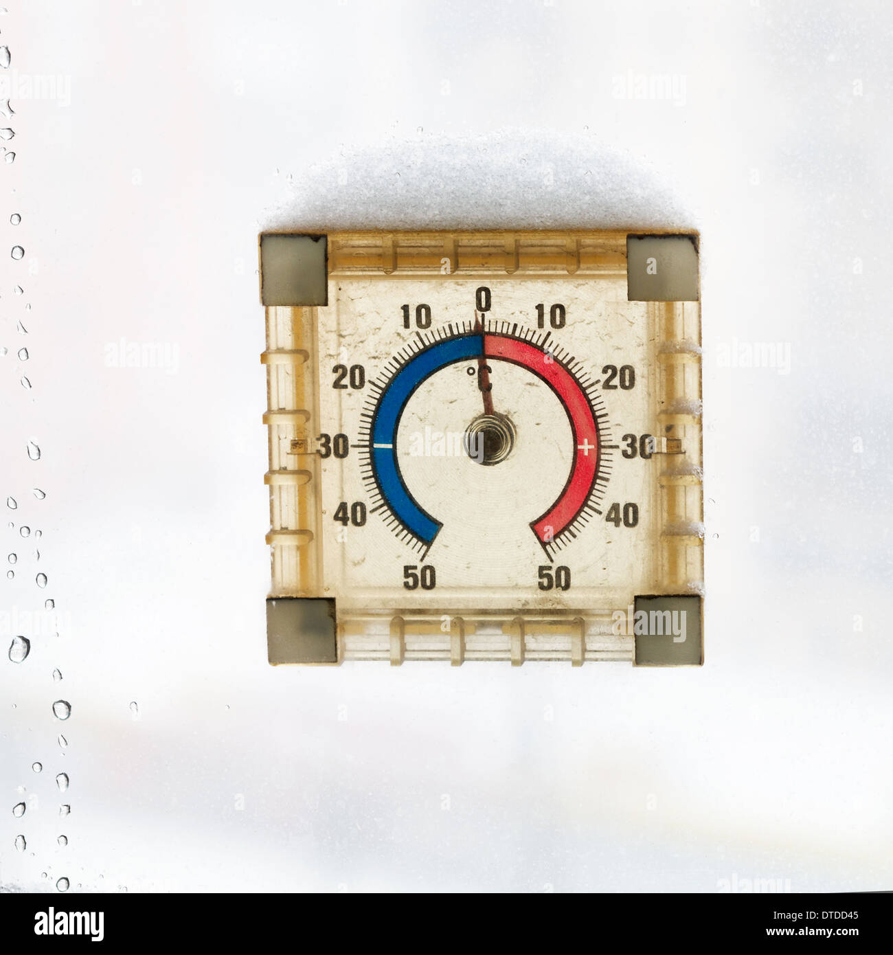 zero degrees on home window thermometer in warm winter day Stock Photo ...
