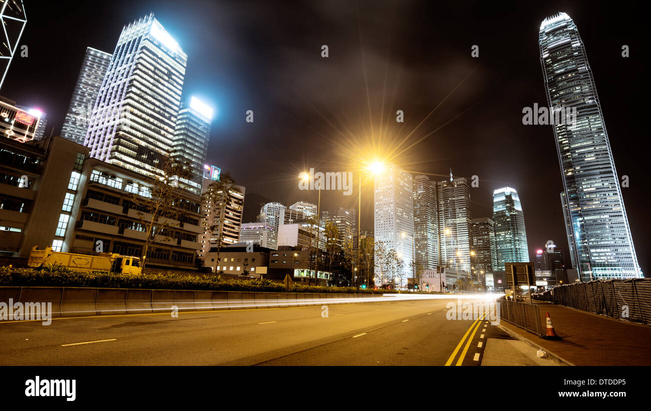 Highway and city at night Stock Photo - Alamy
