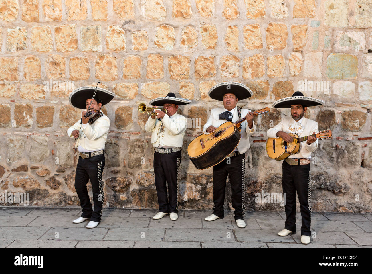 A mariachi band dressed in traditional charro costumes November 5, 2013 ...