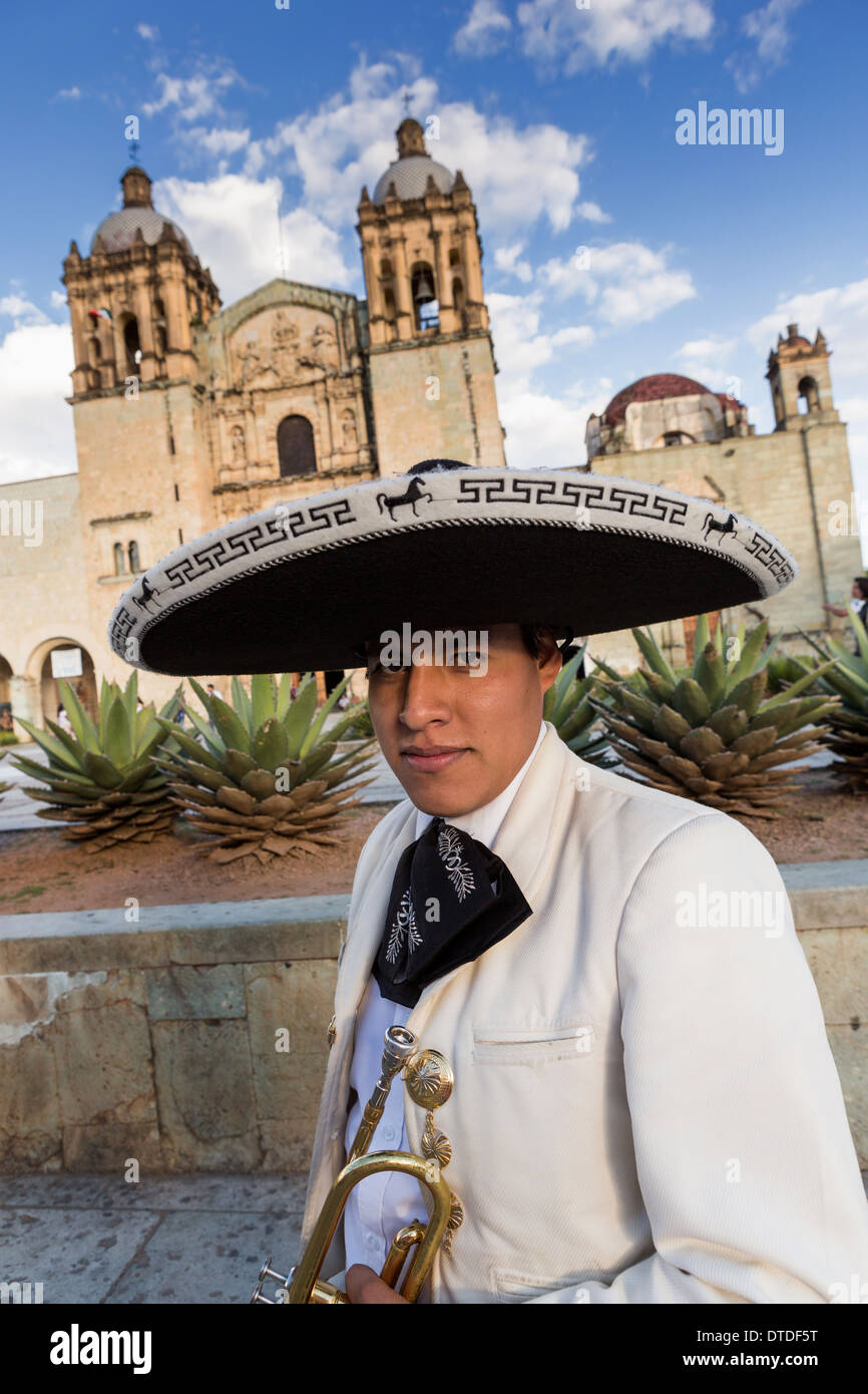 A mariachi musician dressed in traditional charro costumes November 5 ...
